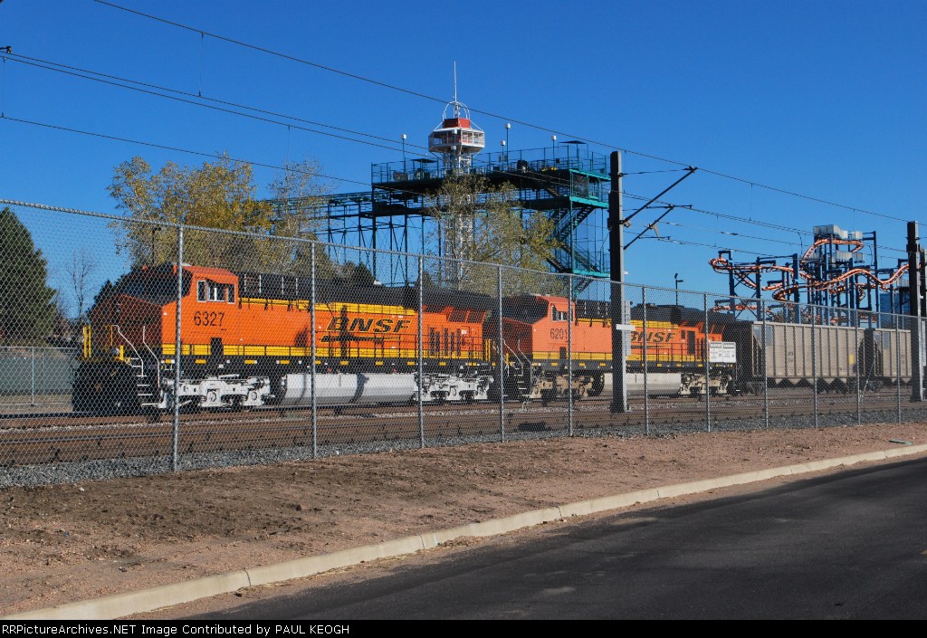 The two ES44AC's BNSF 6327 and BNSF 6201 wait for a crew to roll north towards Sterling, Colorado